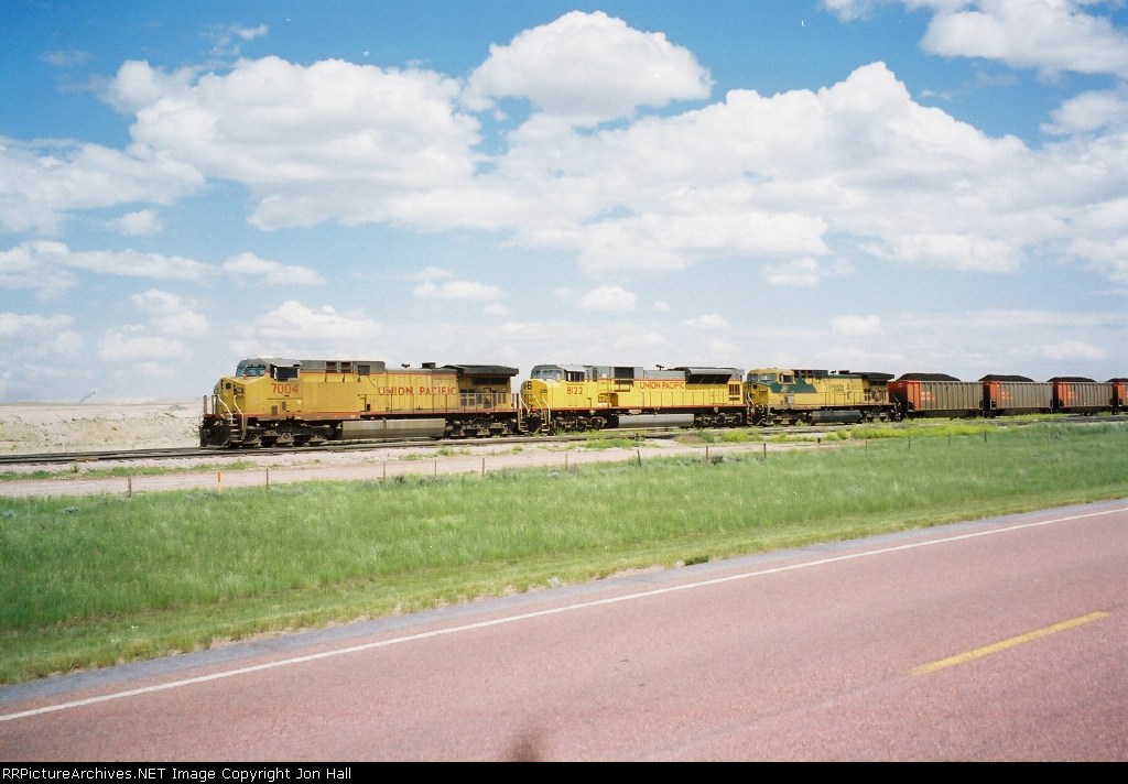 UP 7004, 8122 & CNW 8831